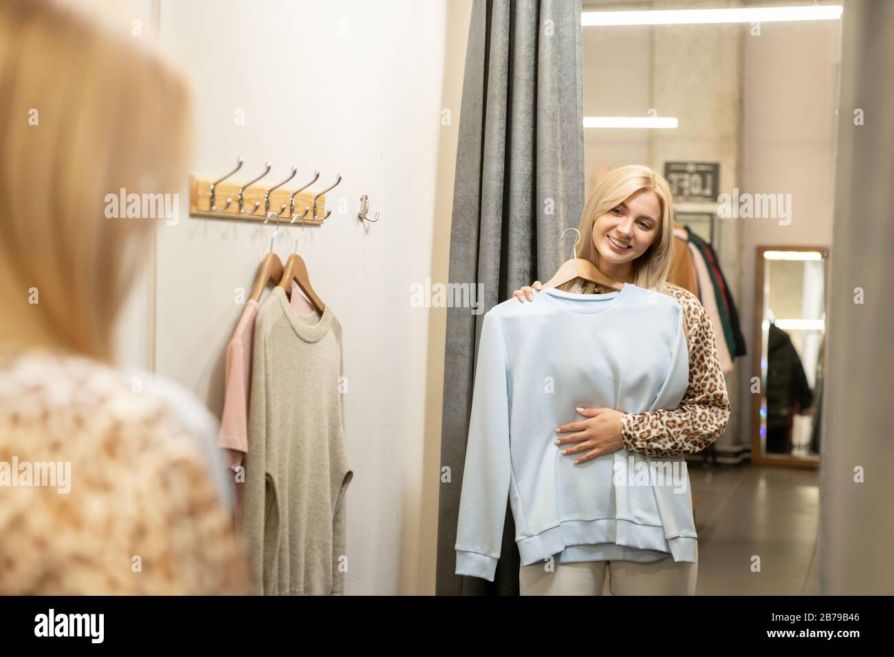 Two women in changing room hi-res stock photography and images - Alamy