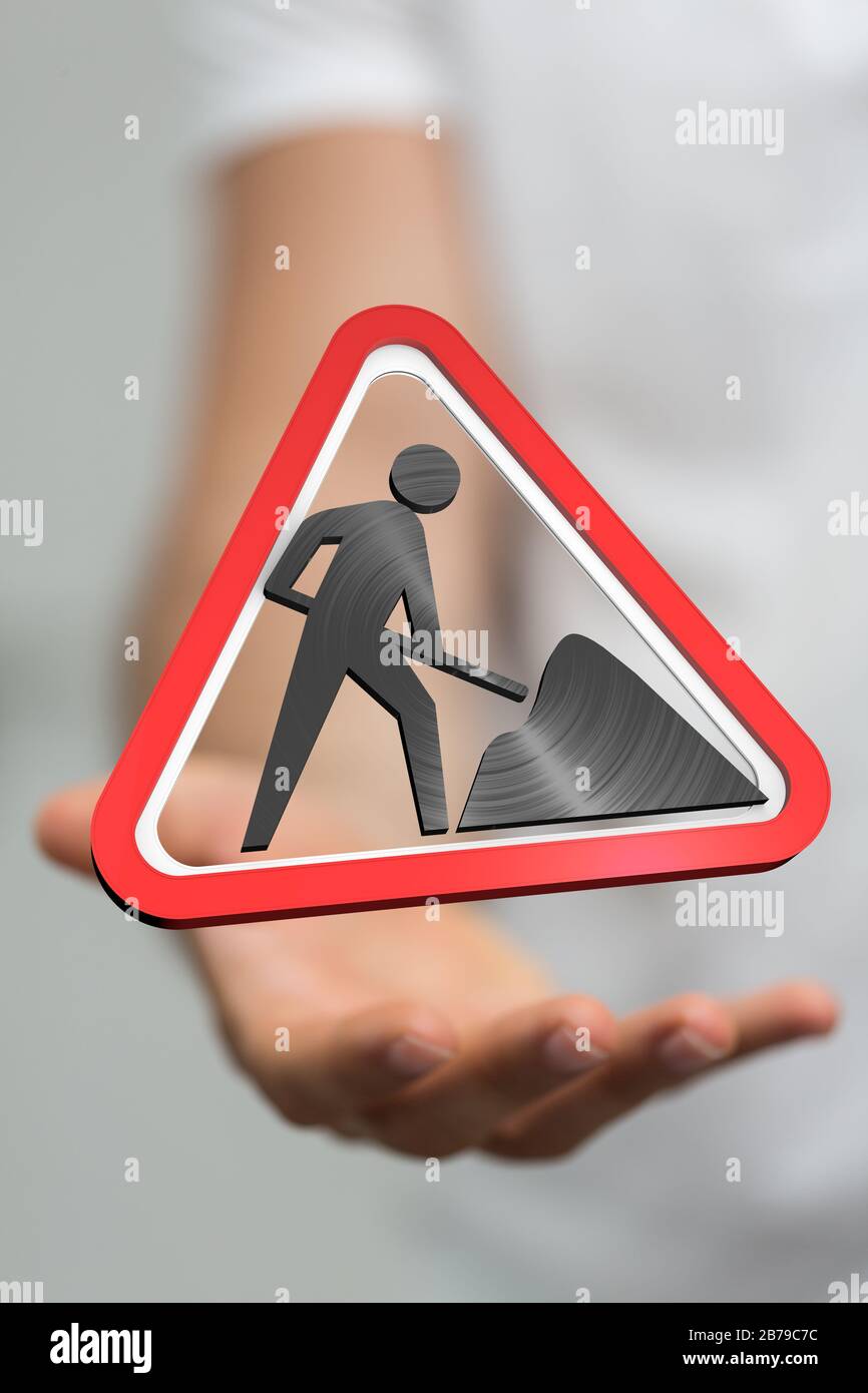 A under process sign in hand Stock Photo - Alamy