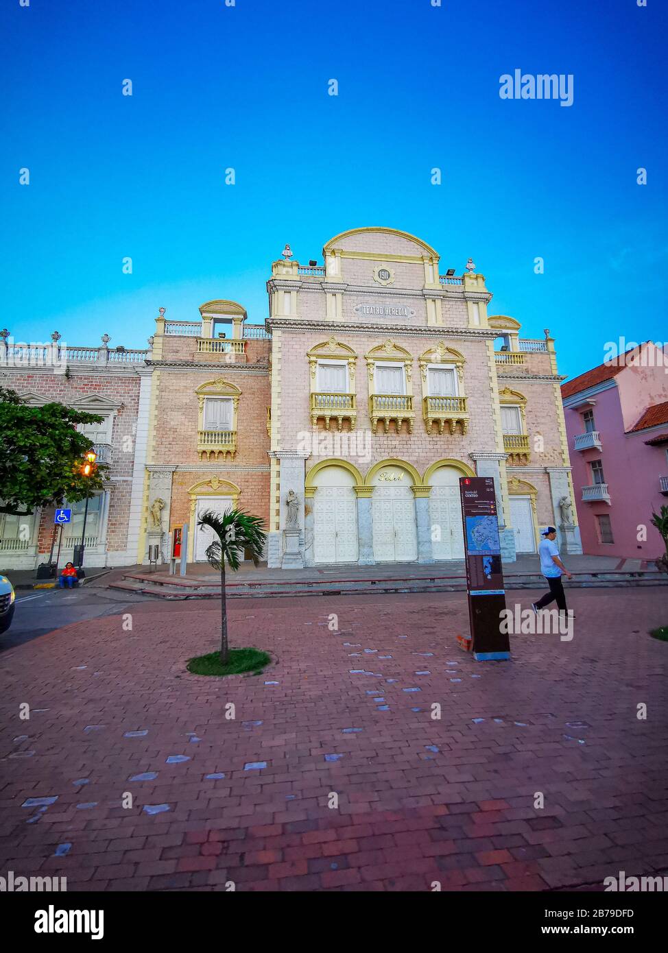 CARTAGENA, COLOMBIA - NOVEMBER 09, 2019: Colorful buildings in a street ...