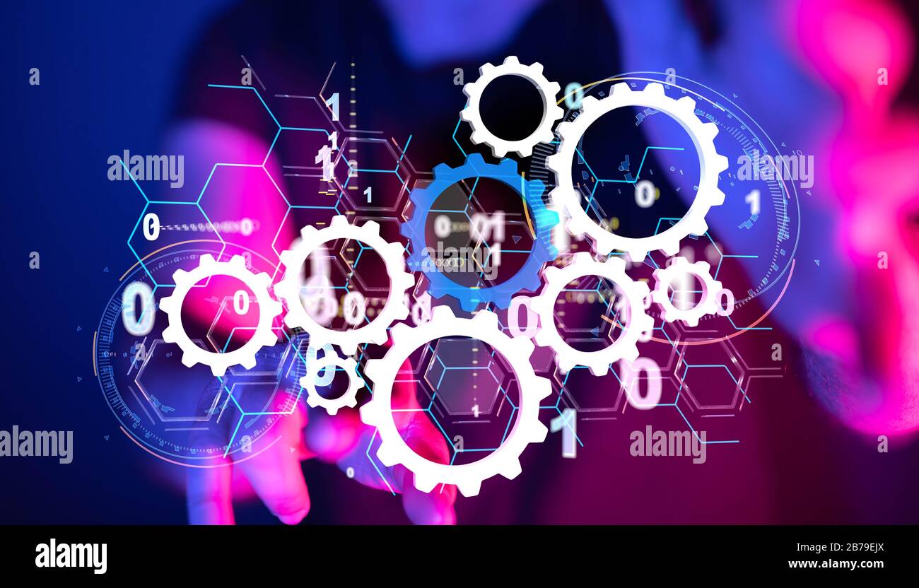 Man holding virtual gears depicting industrial technology development ...