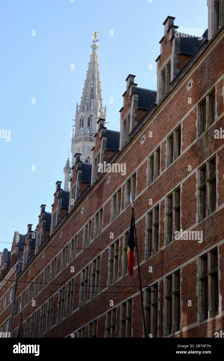 Historic tower behind residential brick building in the city of ...