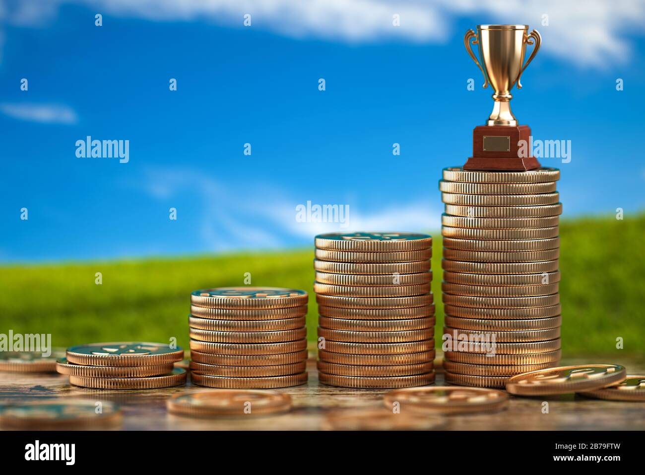 Trophy cup on stacks of coin. Concept of success, growing business and ...