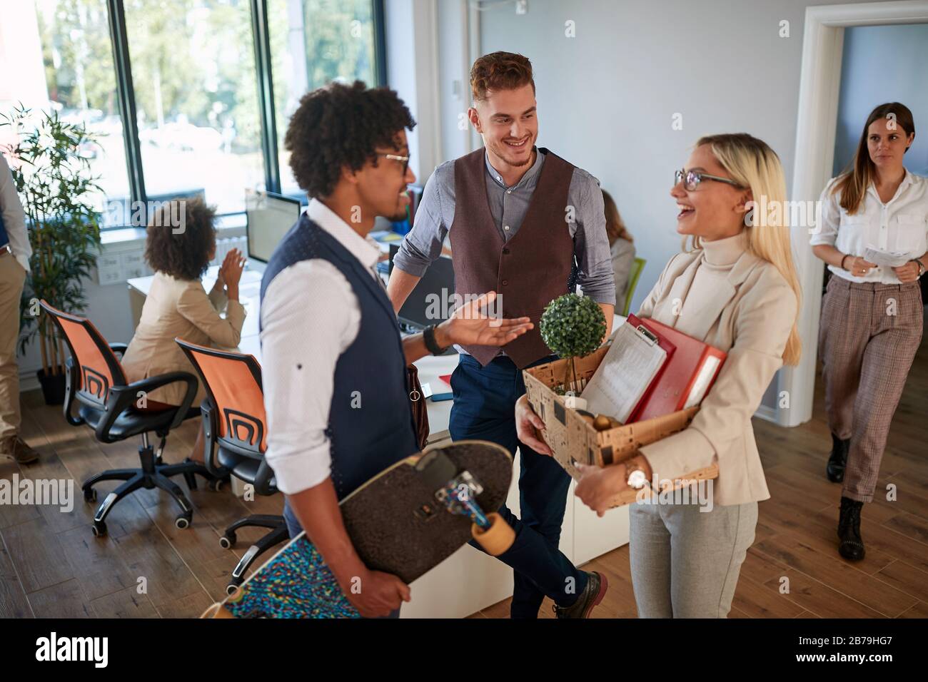Business team meets a new employee . Smiling young business woman on ...