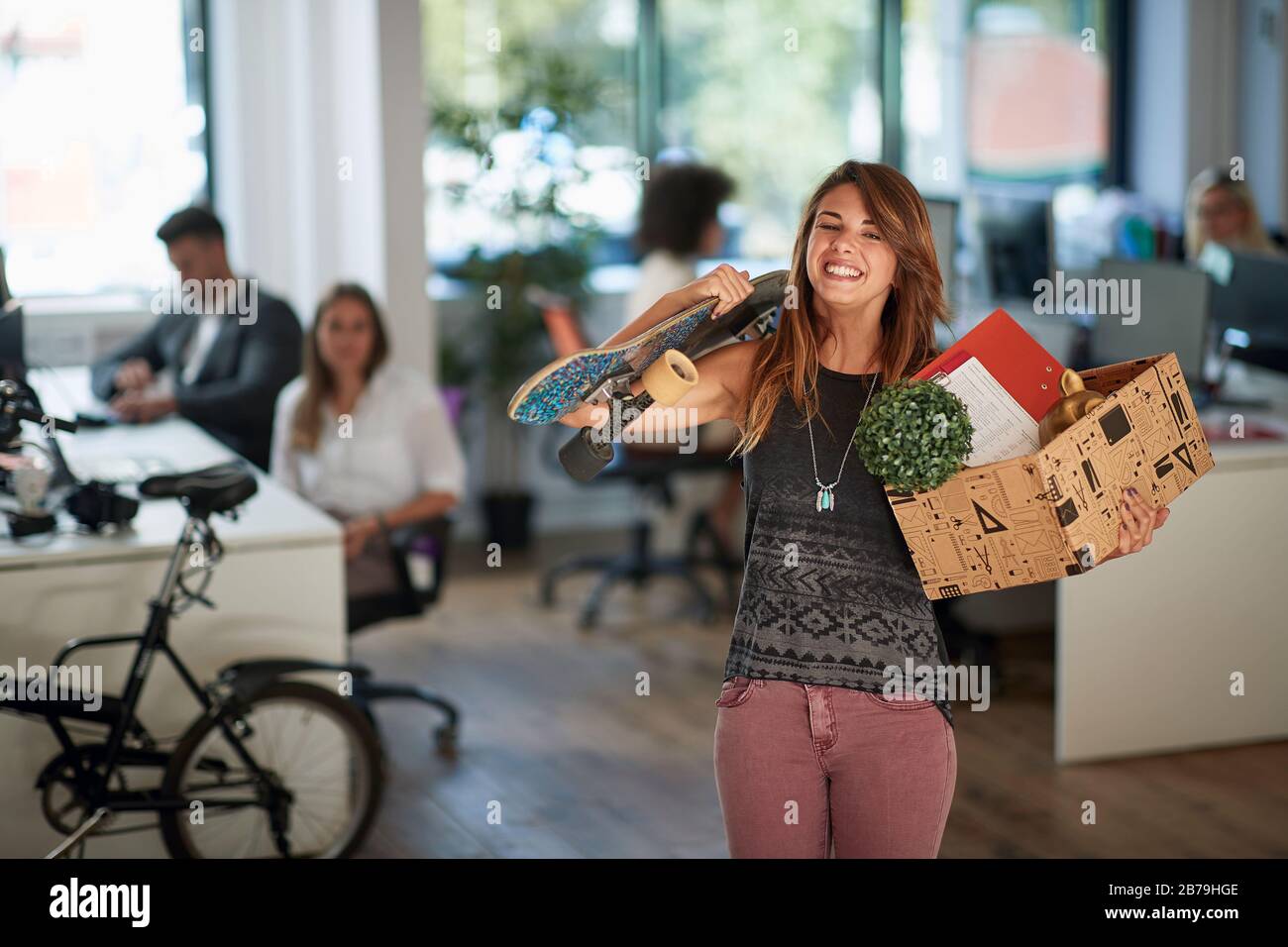 Leaving work carrying box hi-res stock photography and images - Alamy