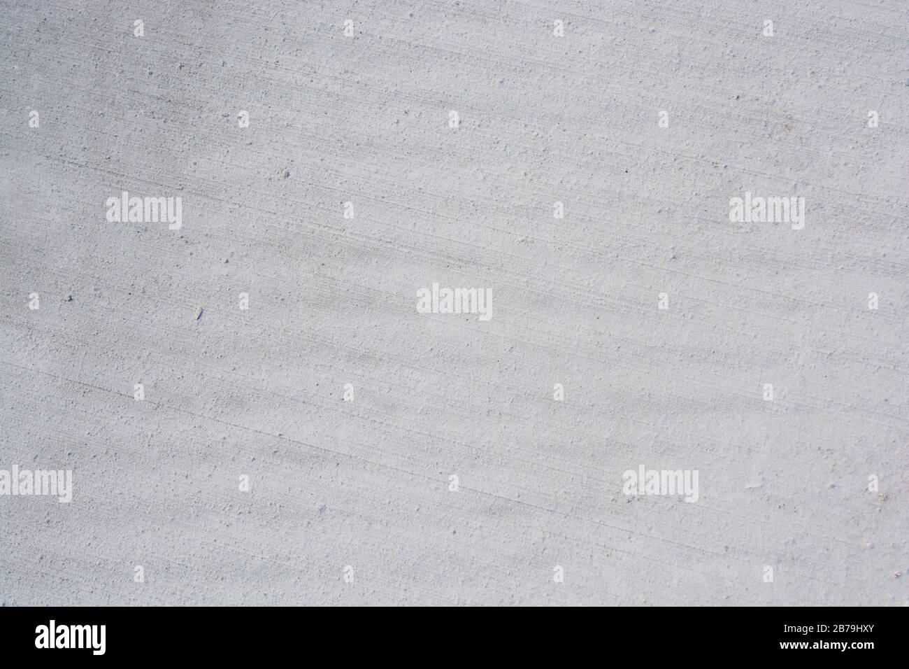Pattens are formed on a concrete background Stock Photo - Alamy