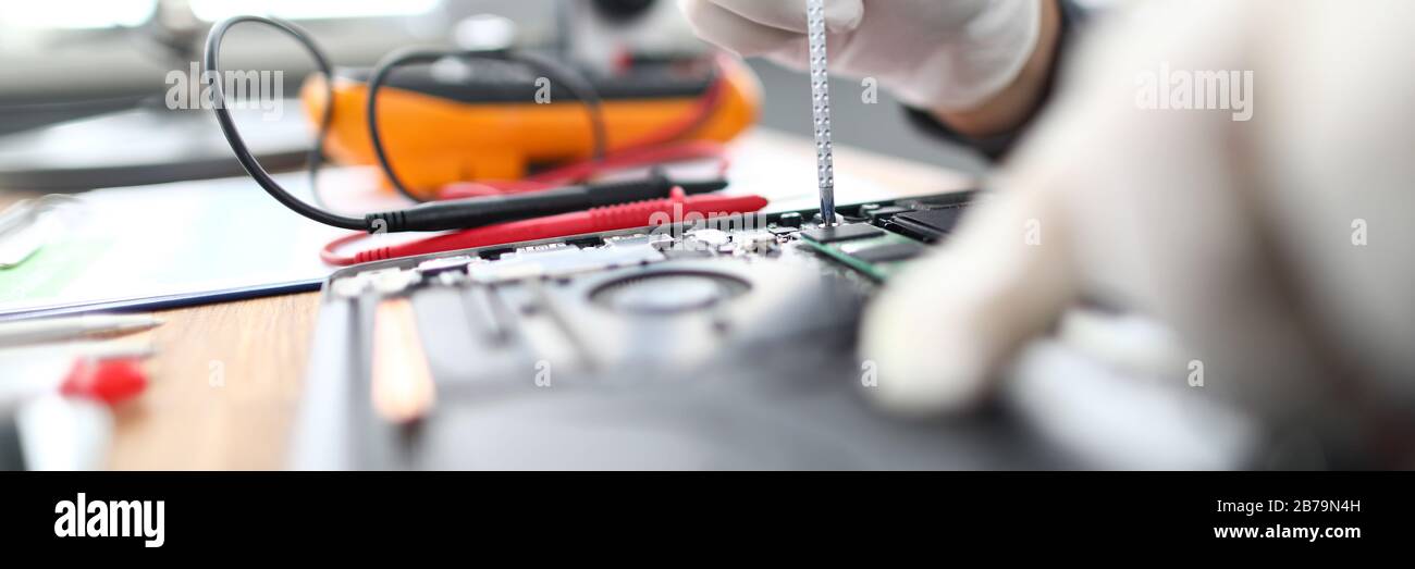 Gadgets repairing and maintenance center Stock Photo - Alamy