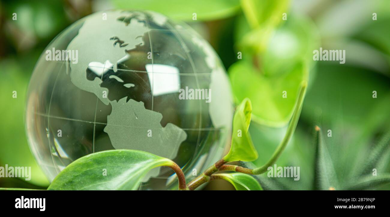 A green earth concept glass sphere Stock Photo - Alamy