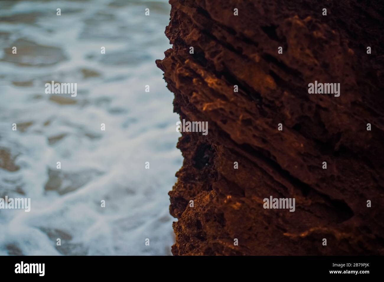Storm in the ocean, sea waves crashing on rocks on the beach coast ...