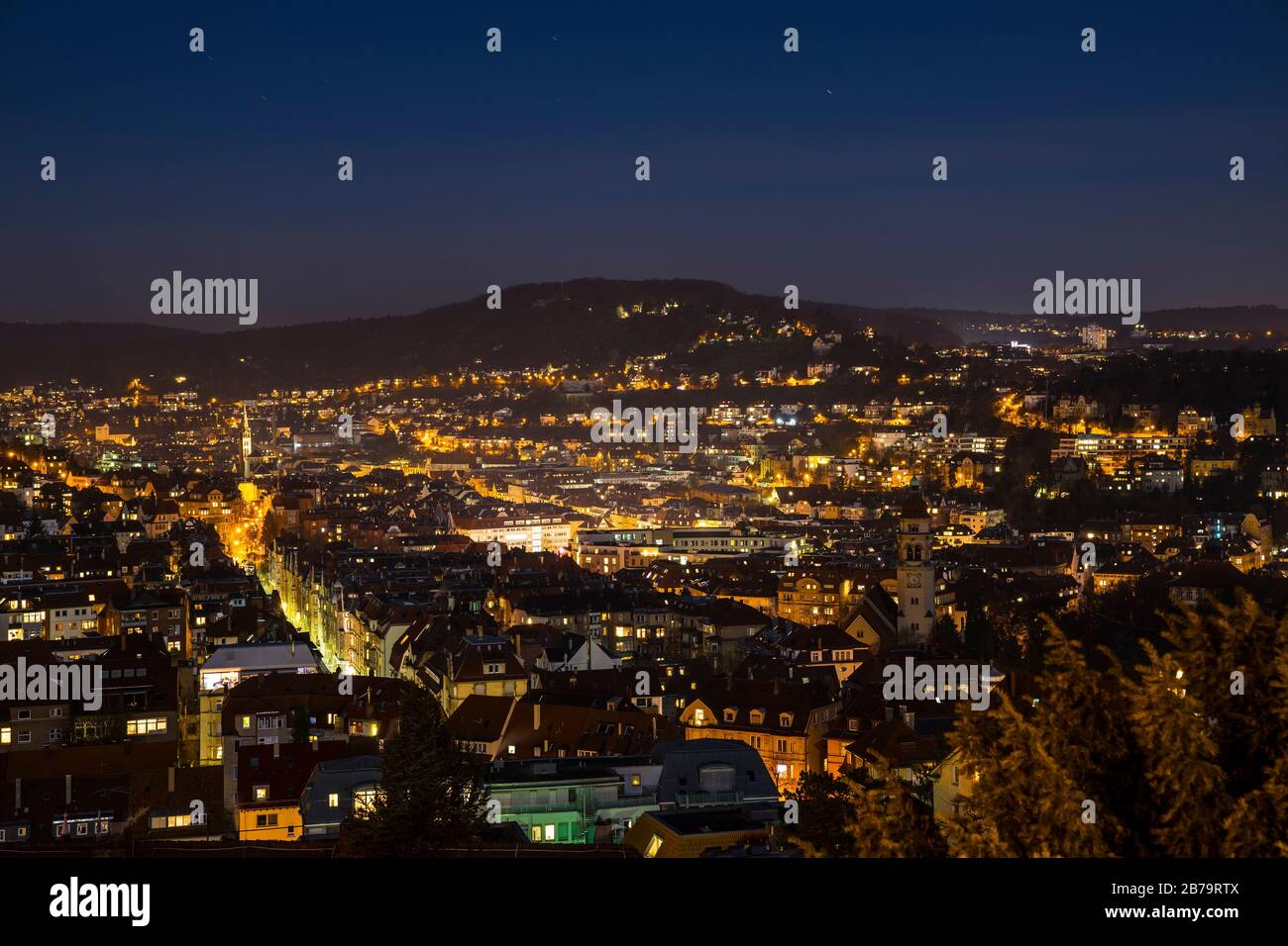 Germany, Magical aerial view above illuminated skyline of city ...