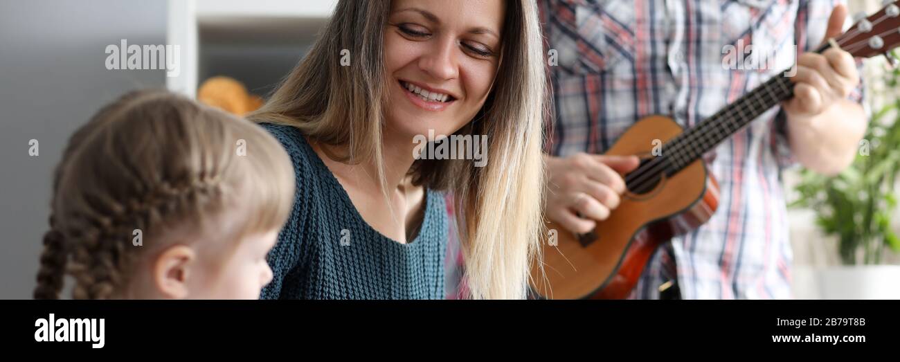Family having fun at home Stock Photo - Alamy