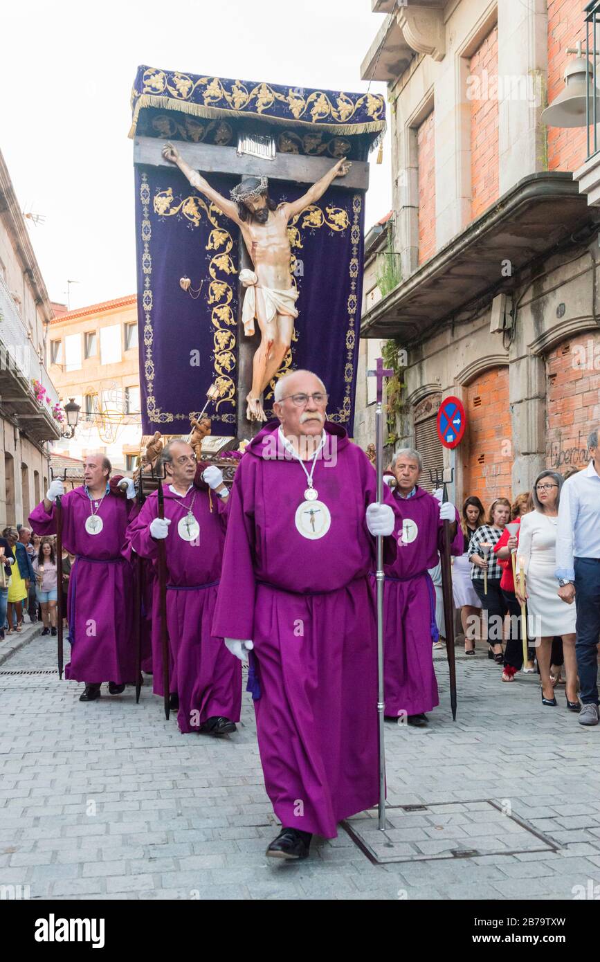 Evening procession with Catholic brothers carrying statue of Christ the ...