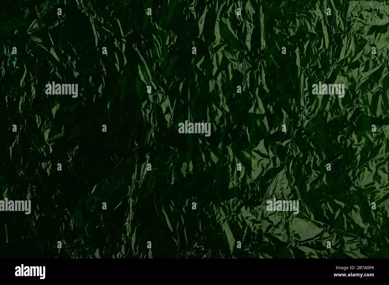 Green plastic surface background close up view Stock Photo - Alamy