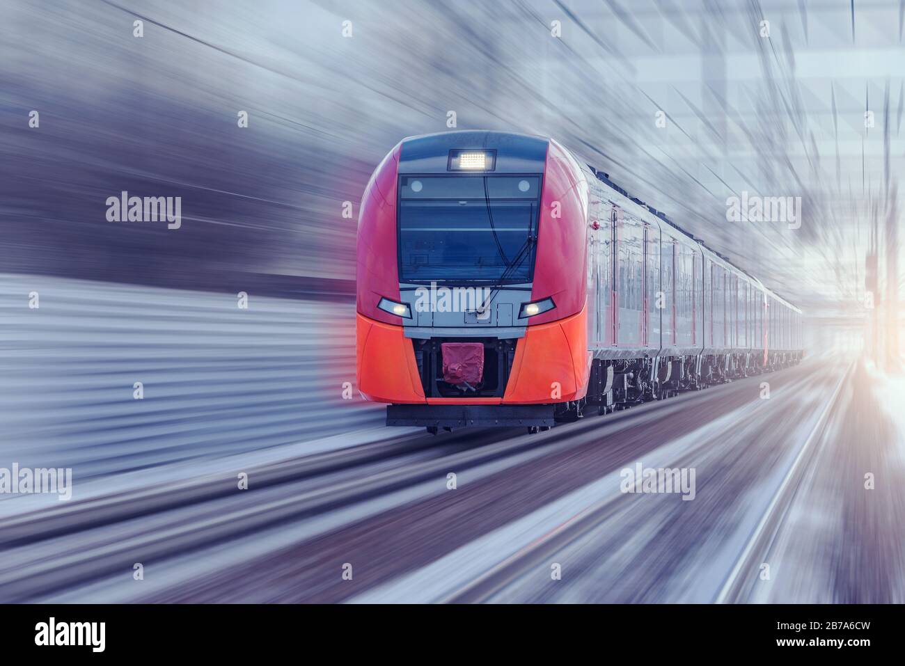 Highspeed train approaches to the station platform Stock Photo - Alamy