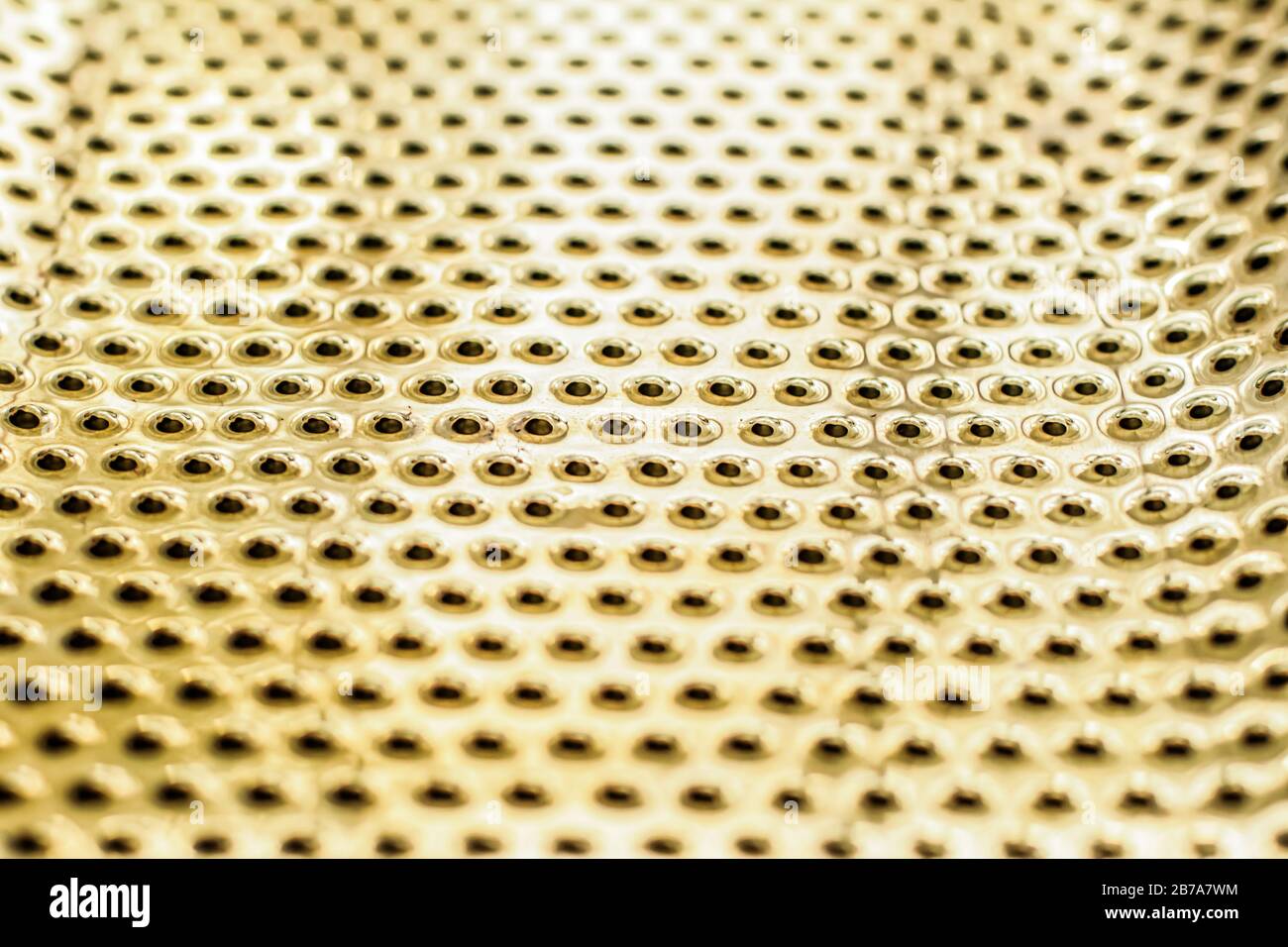 Texture of golden metallic surface as background, materials and ...