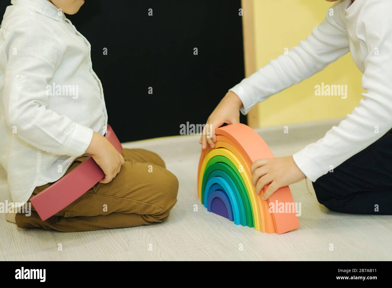 Boys play in different intelectual games in preschool classroom Stock ...