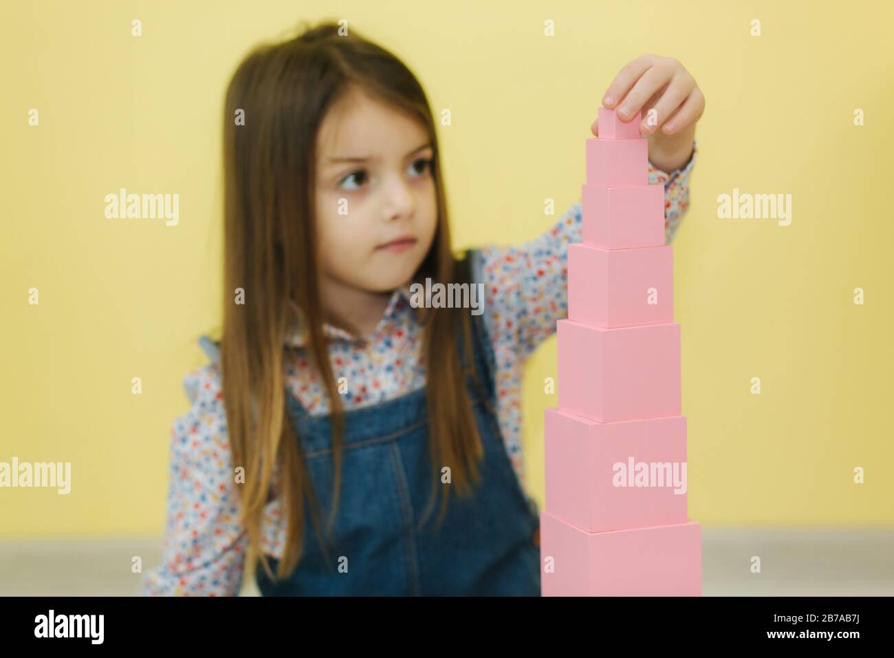 Kids group build school tower hi-res stock photography and images - Alamy