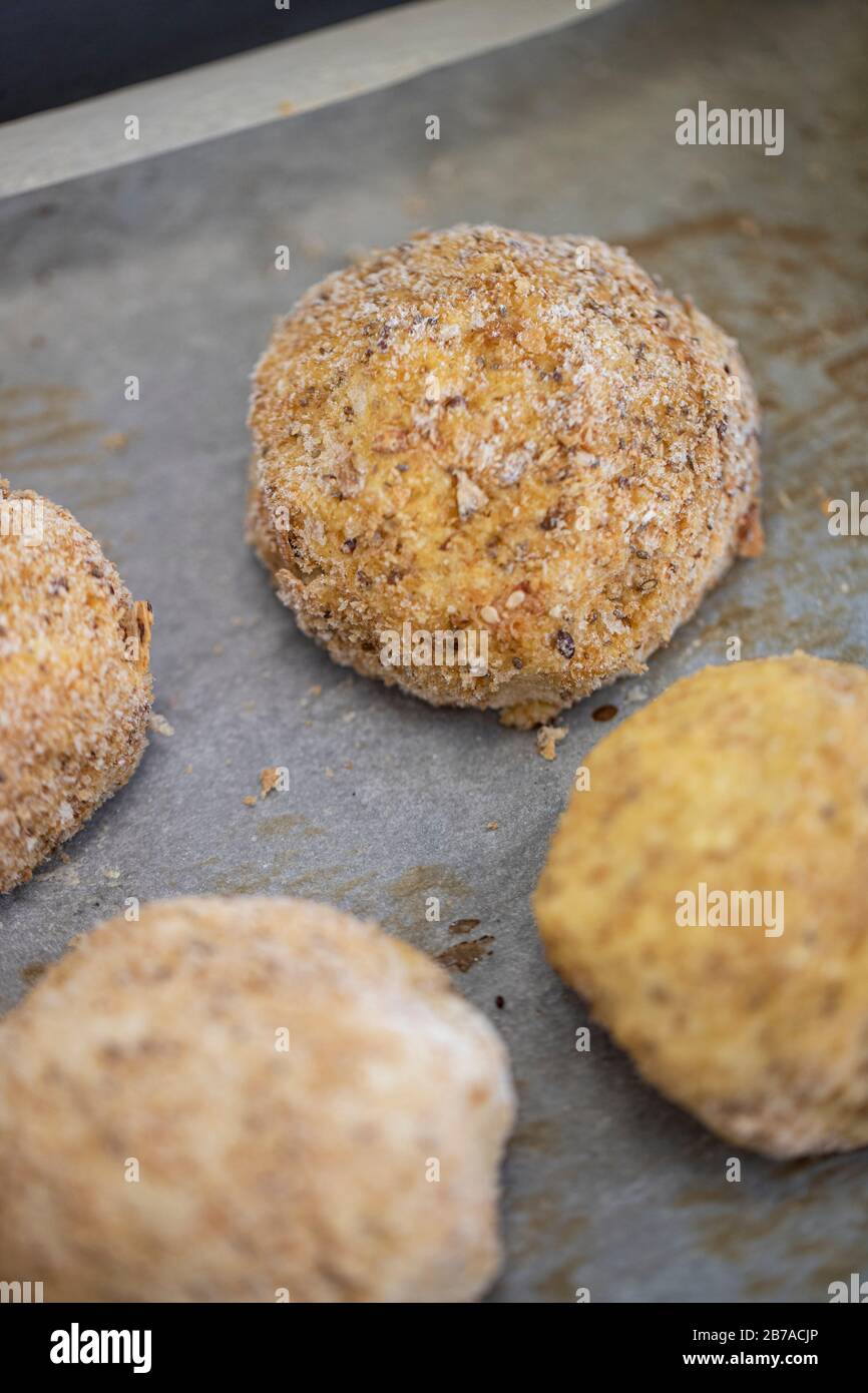 Messy dirty bread preparing and baking process with tools pots and mess ...