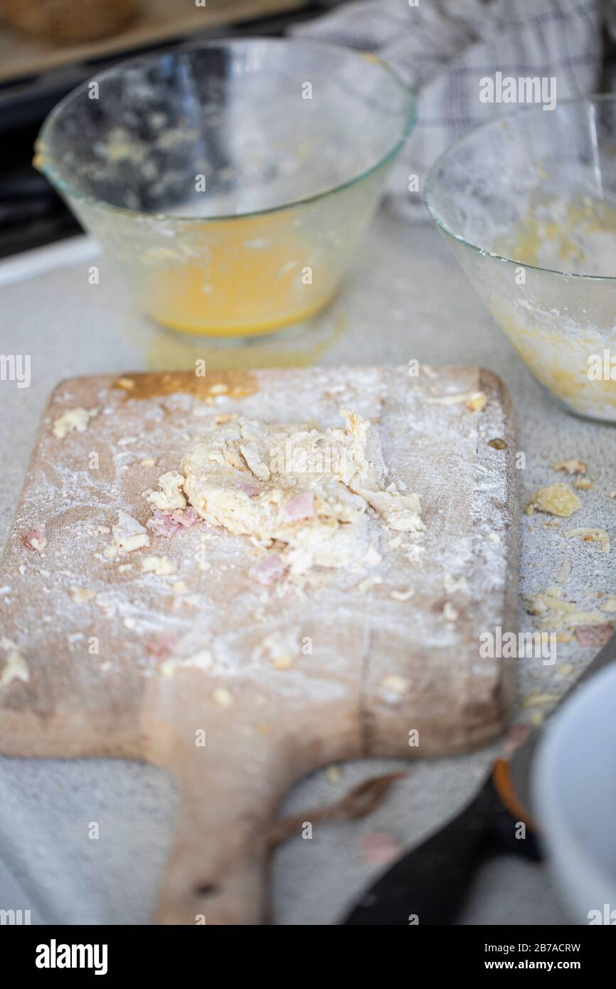 Messy dirty bread preparing and baking process with tools pots and mess ...