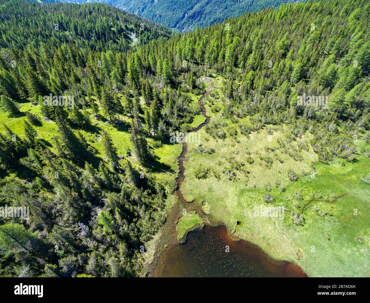 pond with a stream seen from above Stock Photo - Alamy