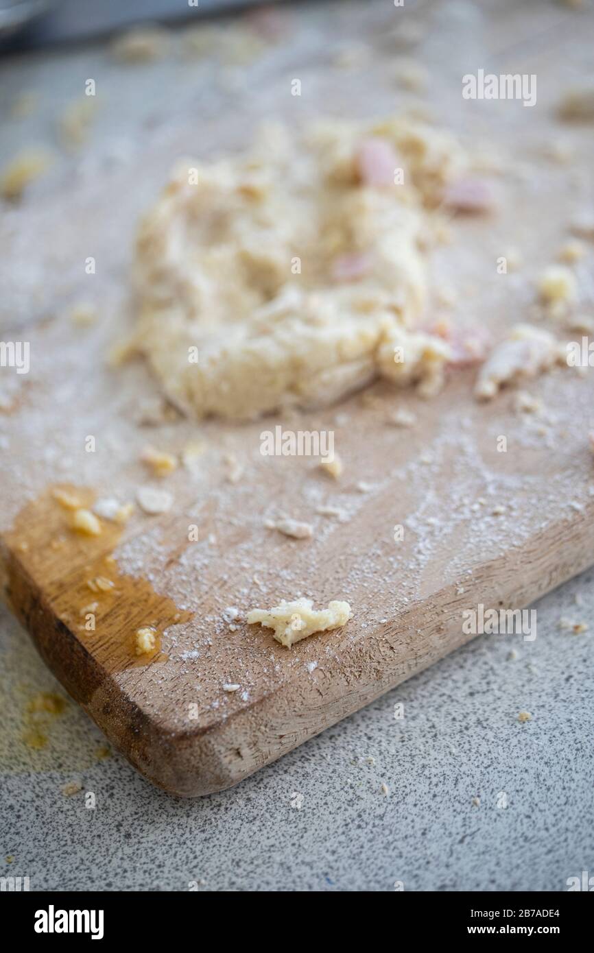 Messy dirty bread preparing and baking process with tools pots and mess ...