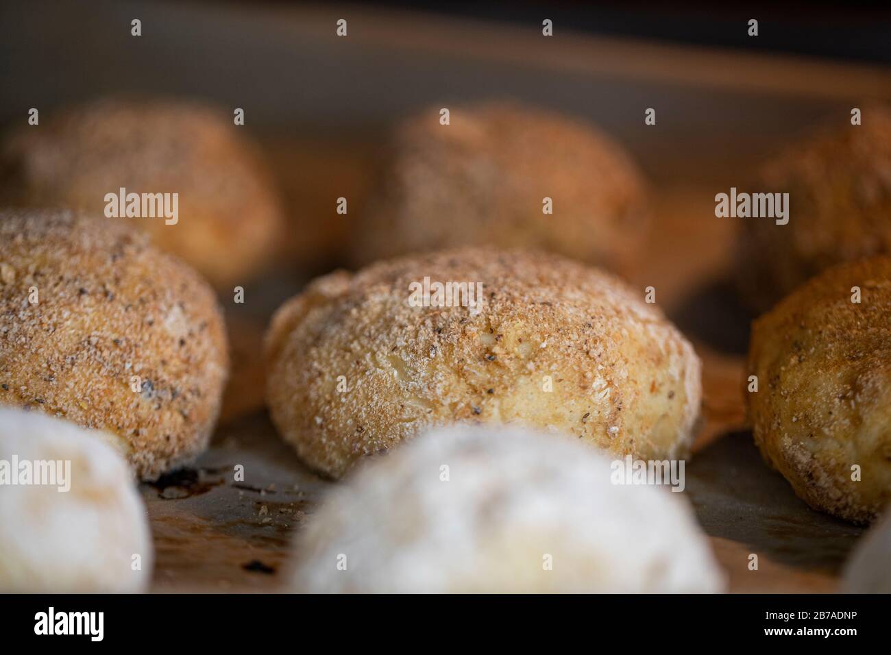 Messy dirty bread preparing and baking process with tools pots and mess ...