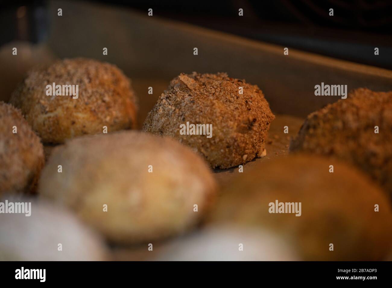 Messy dirty bread preparing and baking process with tools pots and mess ...
