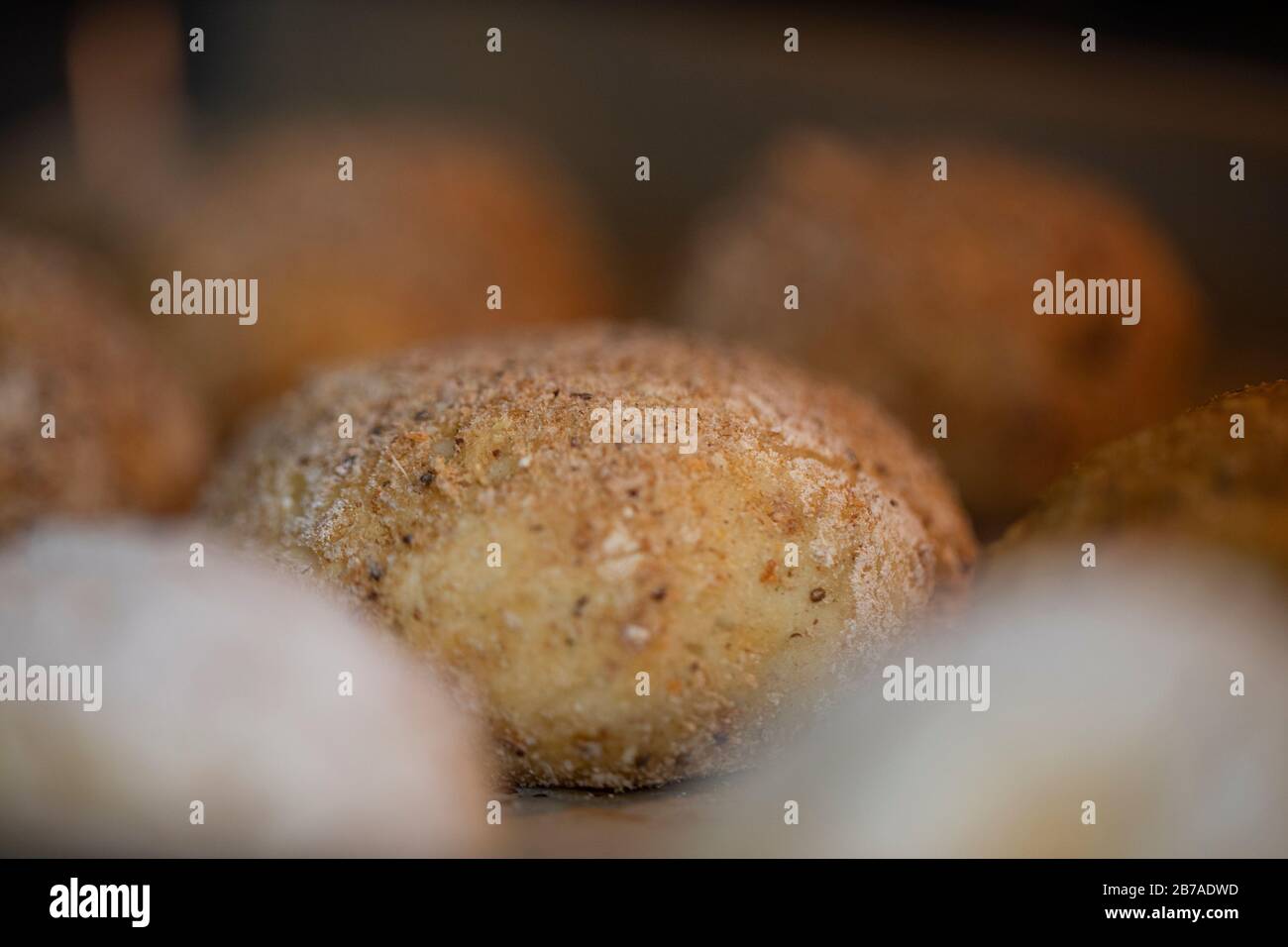 Messy dirty bread preparing and baking process with tools pots and mess ...