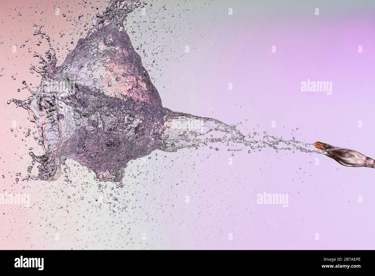 High speed photo of the explosion of the balloon filled with water ...