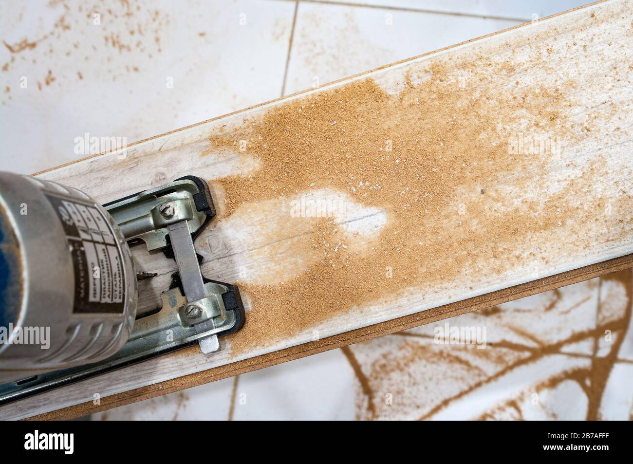 Electric jigsaw at work. Closeup Stock Photo - Alamy