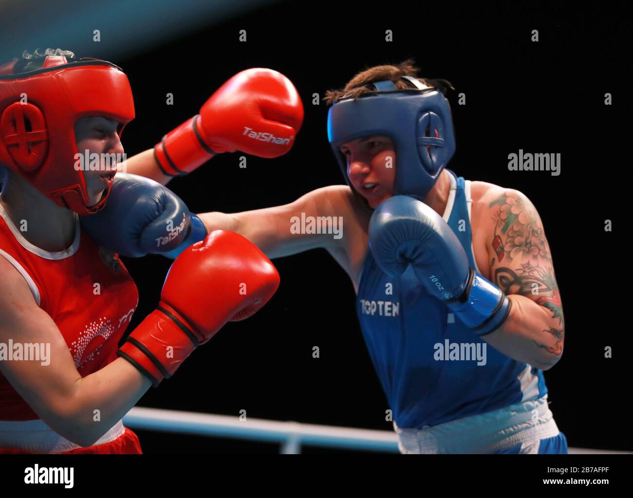 Finland's Elina Orvokki Gustafsson (blue) defeats Serbia's Aleksandra ...