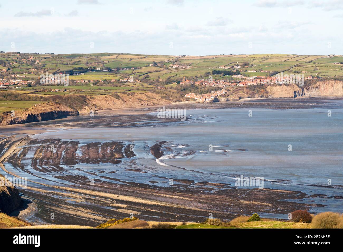 View towards Robin Hood's Bay from Ravenscar showing geological scaurs ...