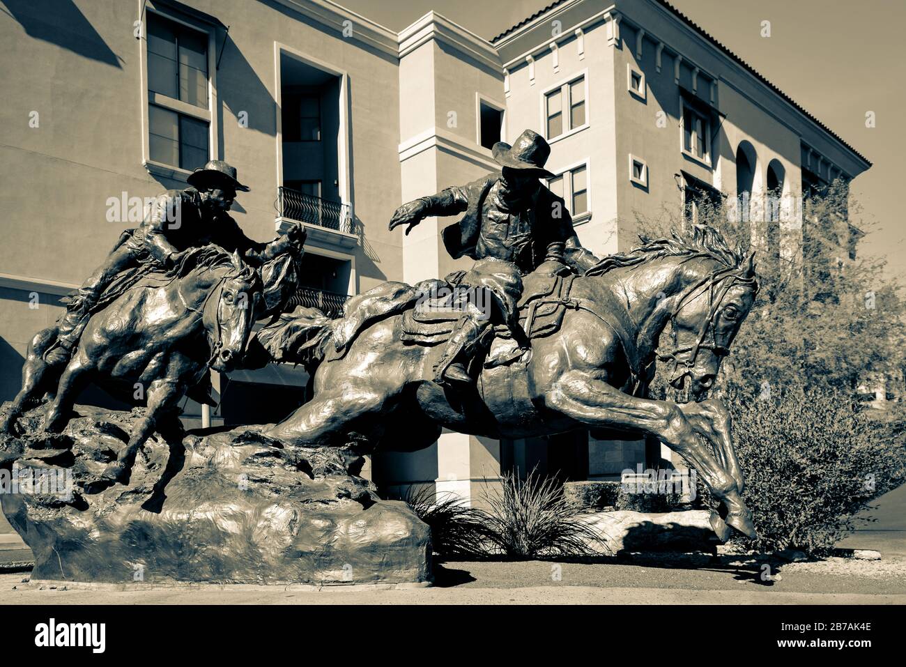 A commemorative bronze equine sculpture, "Passing the Legacy" of two ...