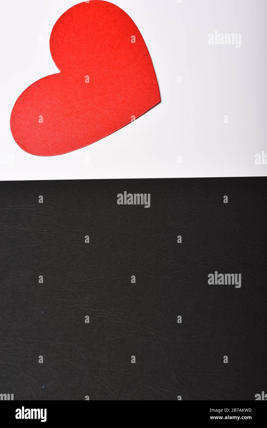 Valentines day card. Red paper heart on black and white background ...