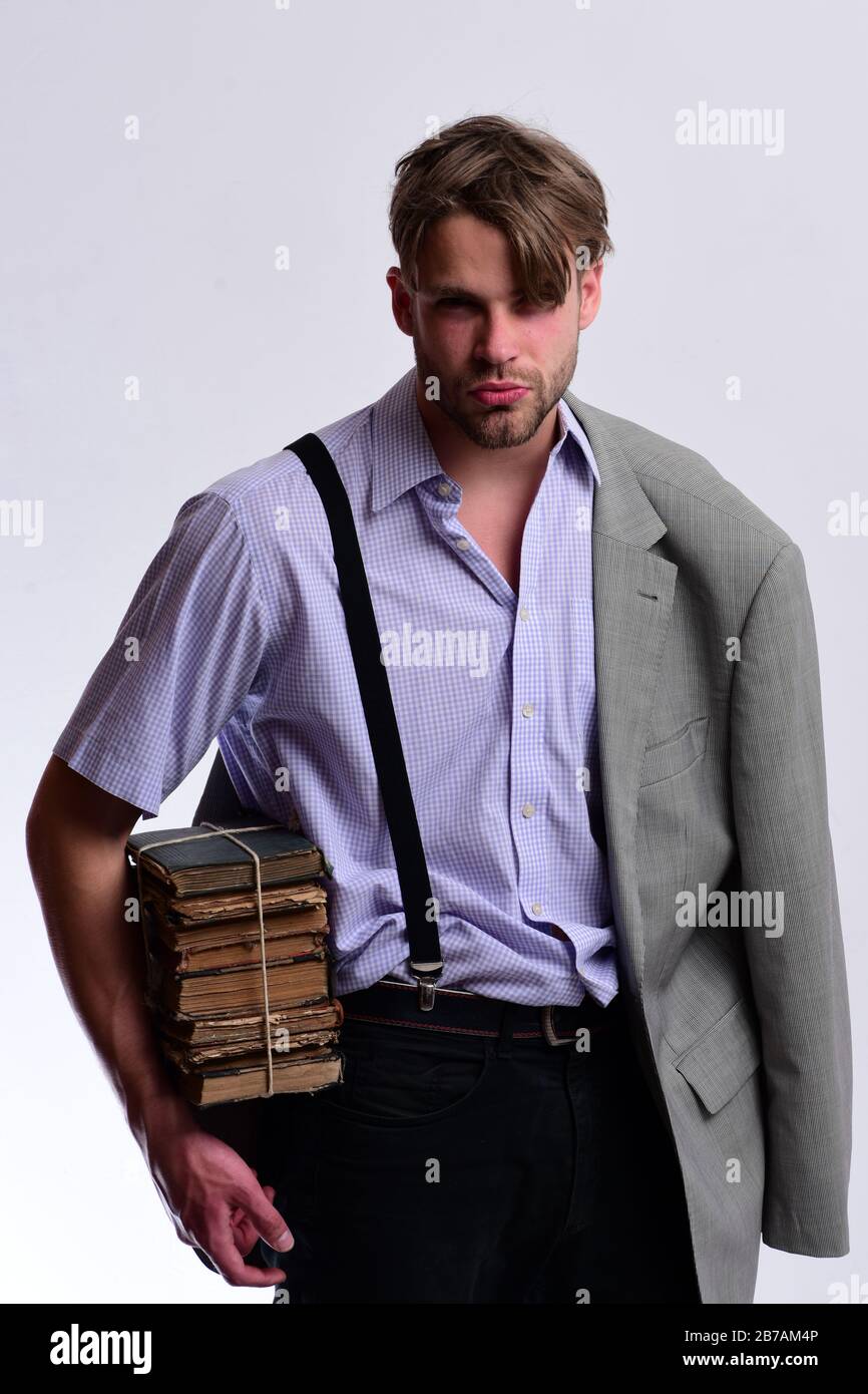 Nerd or bookworm wearing suspenders and jacket on shoulder. Wisehead ...