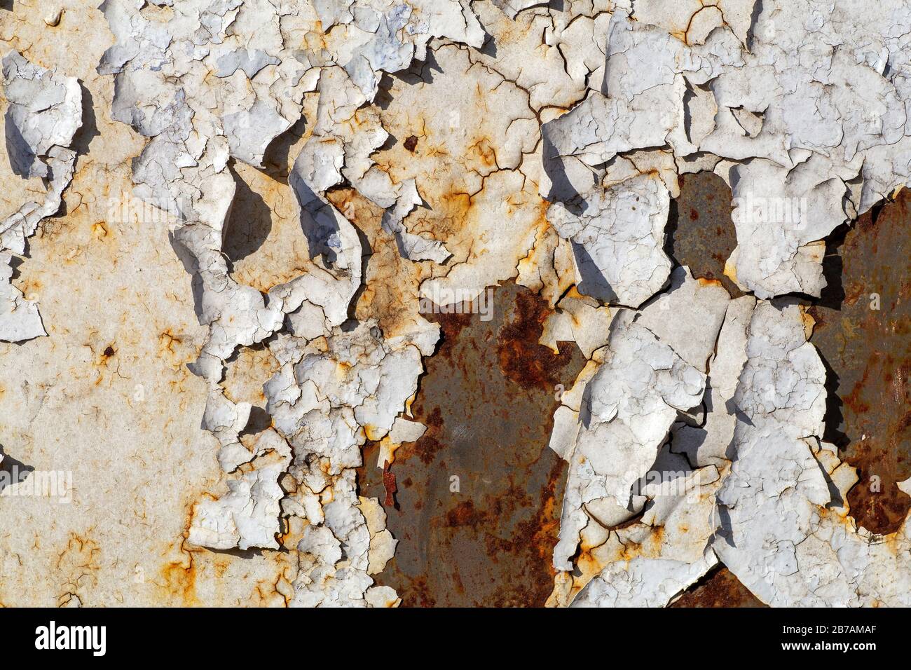Old paint background. Texture and pattern of peeling dried old paint on ...