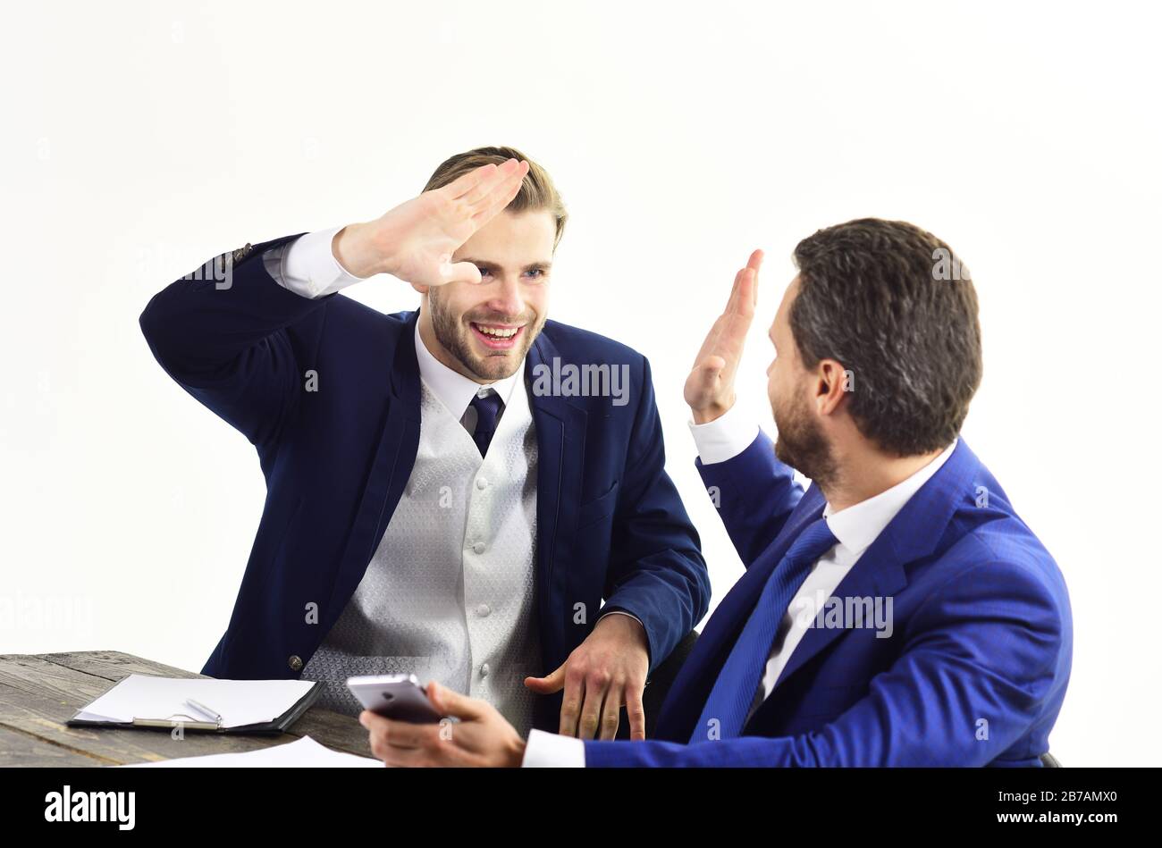 Friends celebrate business victory. Partnership, friendship, support ...