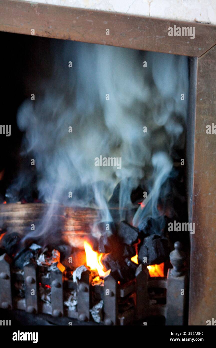 Fire (flamma) in Fireplace of house Stock Photo - Alamy
