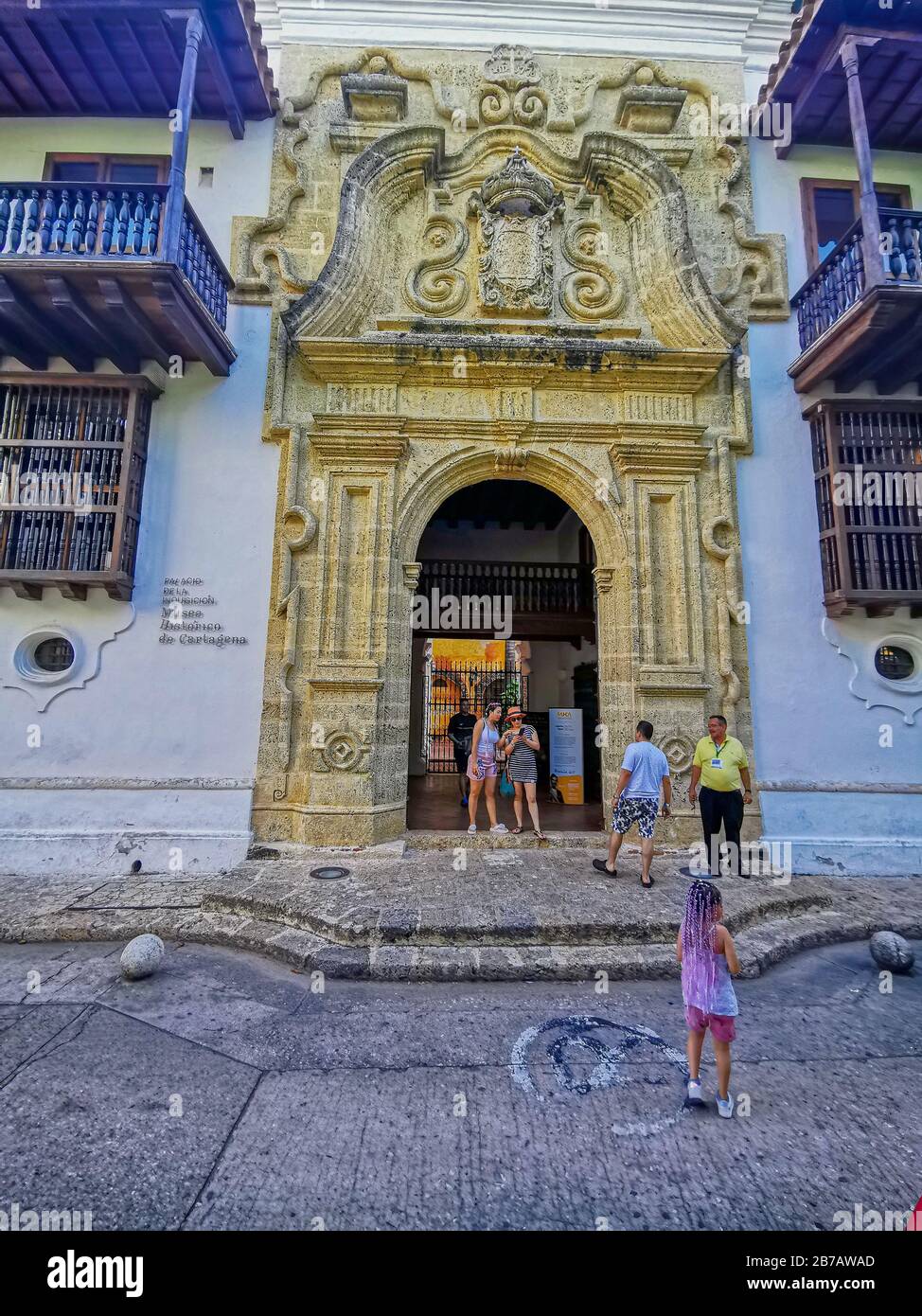CARTAGENA, COLOMBIA - NOVEMBER 09, 2019: Colorful buildings in a street ...