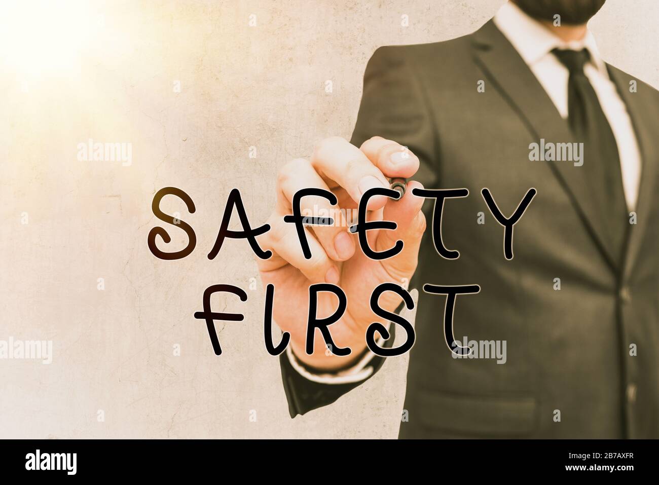 Writing note showing Safety First. Business concept for used to say ...