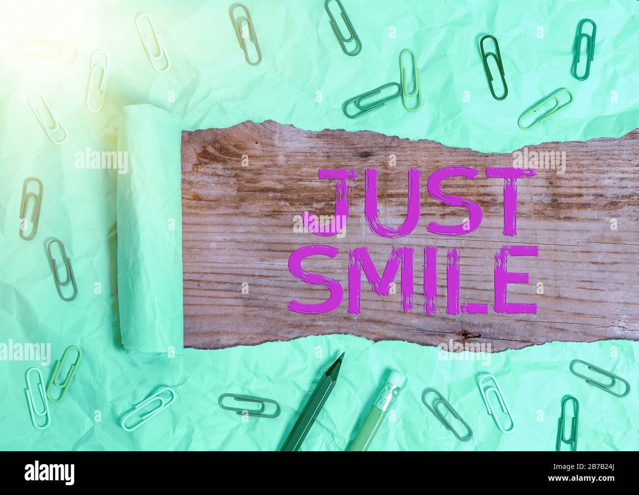Handwriting text writing Just Smile. Conceptual photo assume a facial ...