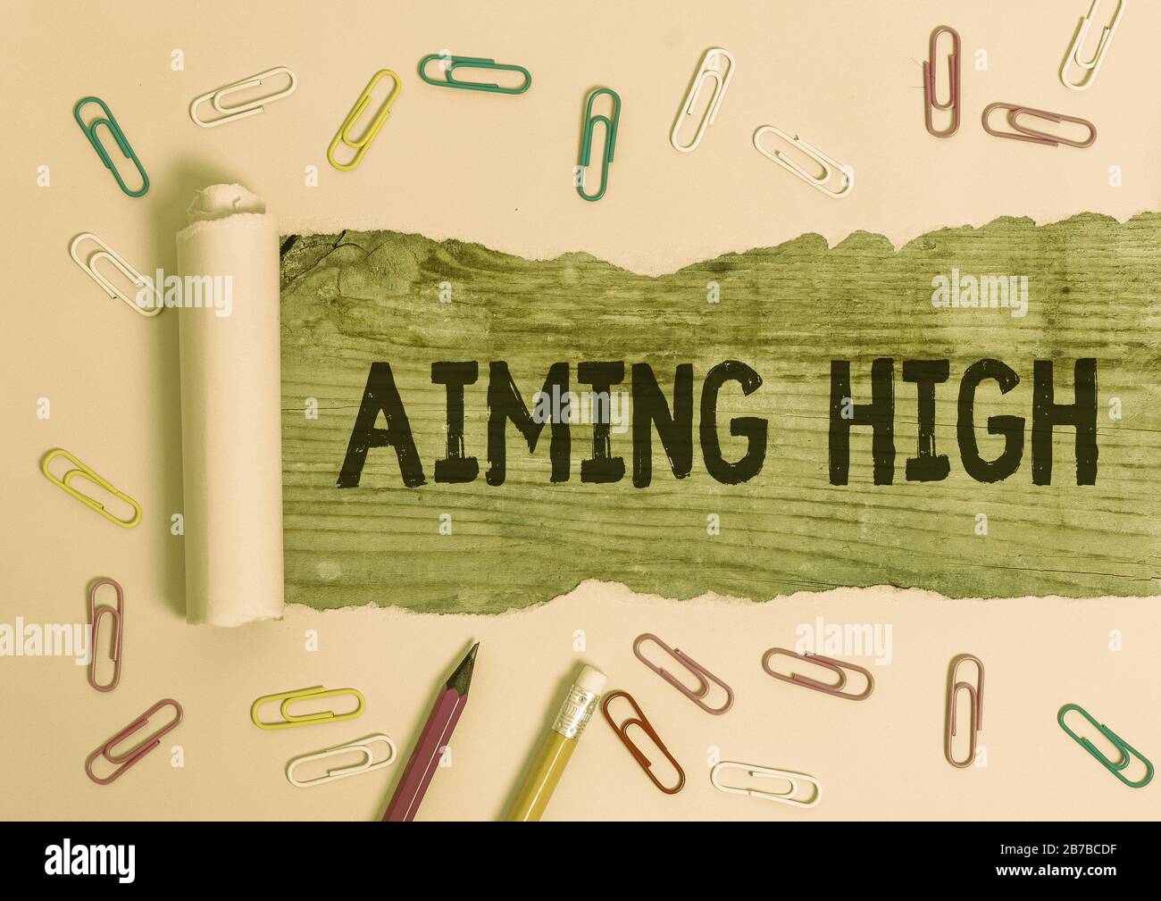 Writing note showing Aiming High. Business concept for a result that ...