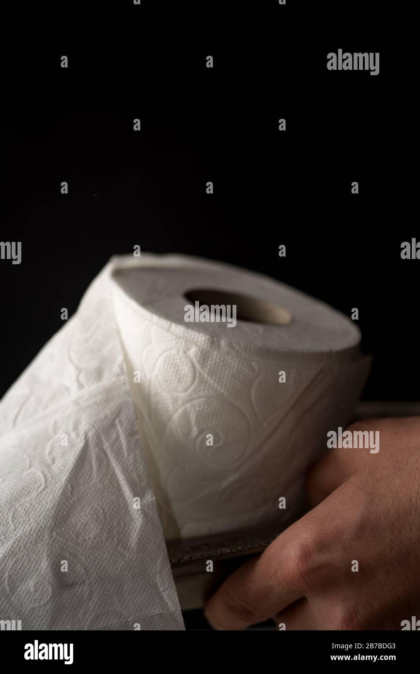 Stockpiling toilet paper during coronavirus crises Stock Photo - Alamy
