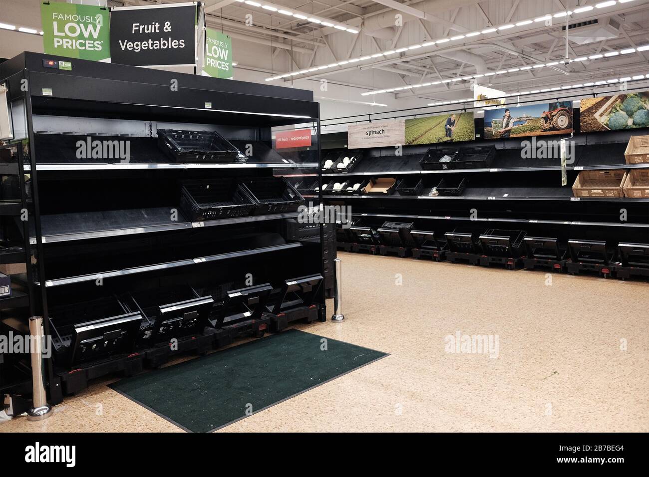 Empty shelves in the fruit and vegetable section of an Asda store in ...