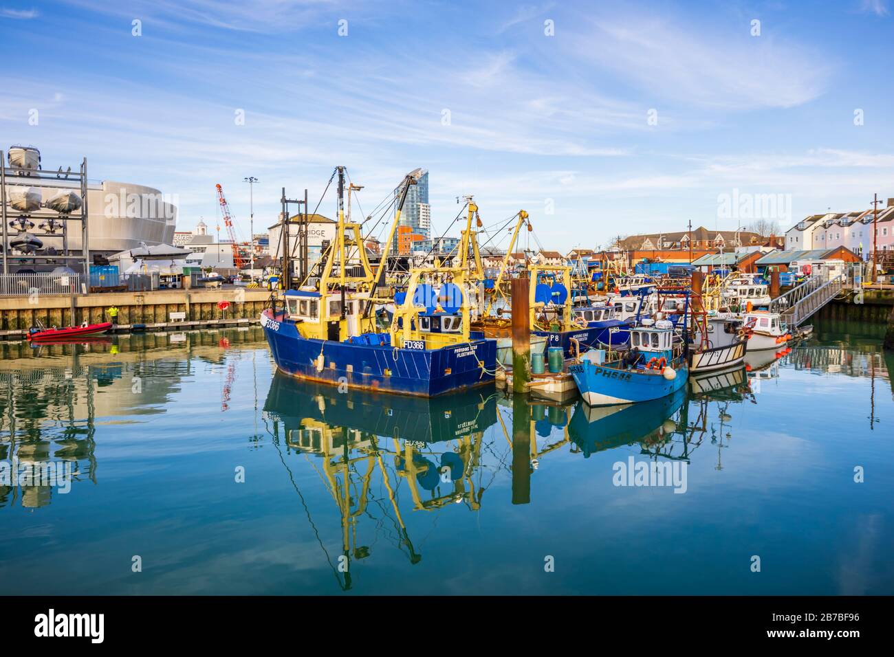 Boats moored in Camber Quay (The Camber), the ancient port in Old ...