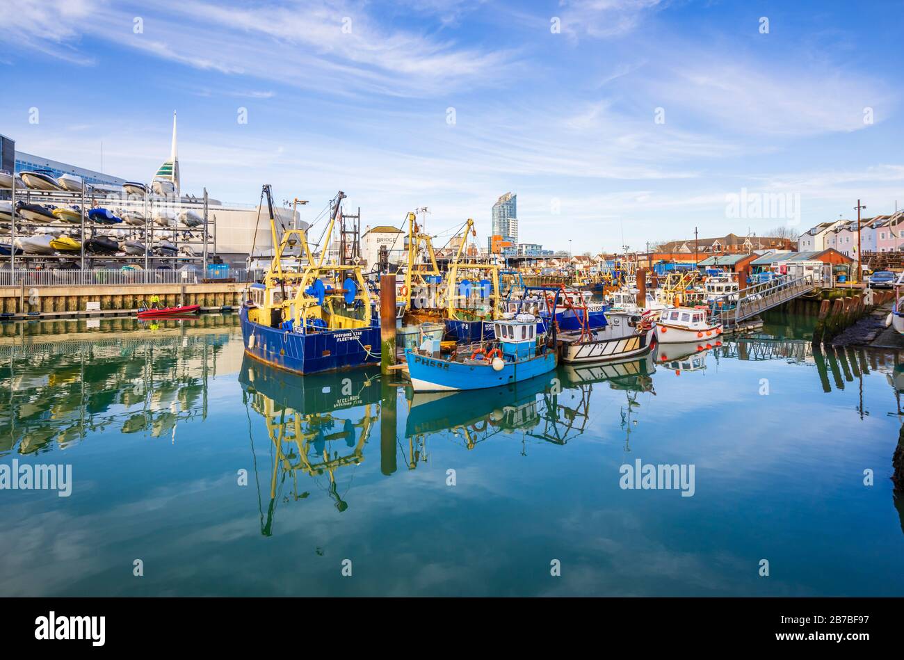 Boats moored in Camber Quay (The Camber), the ancient port in Old ...