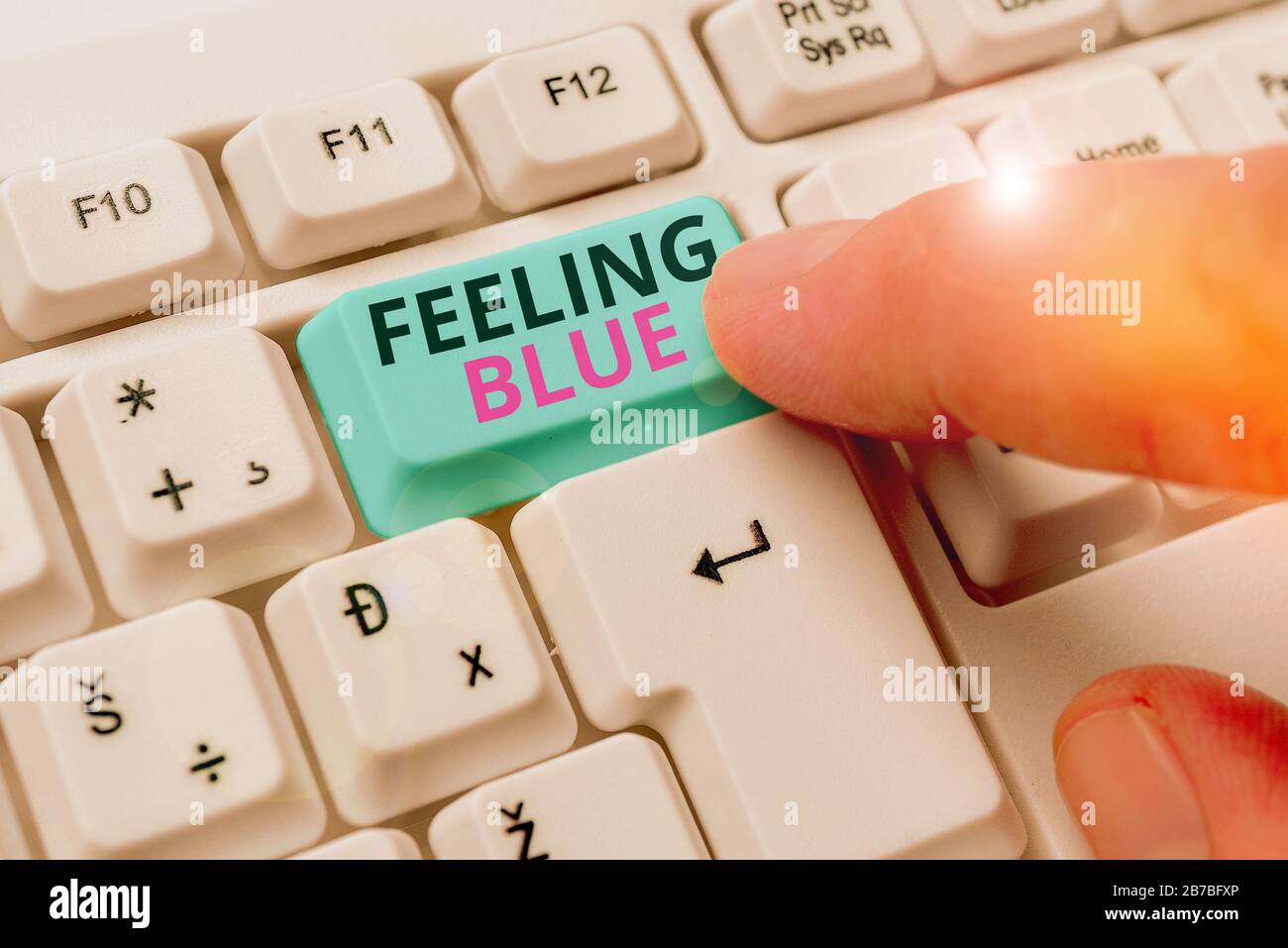 Conceptual hand writing showing Feeling Blue. Concept meaning Feeling ...