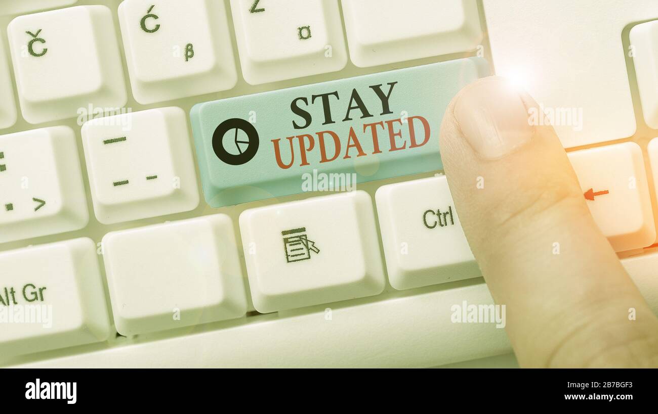 Conceptual hand writing showing Stay Updated. Concept meaning keep ...