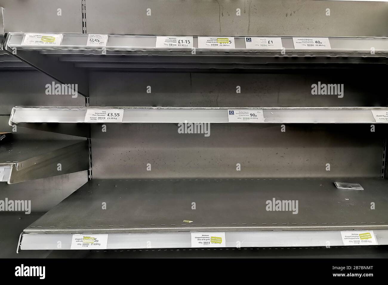 Empty shelves for canned peeled plum and chopped tomatoes due to corona ...