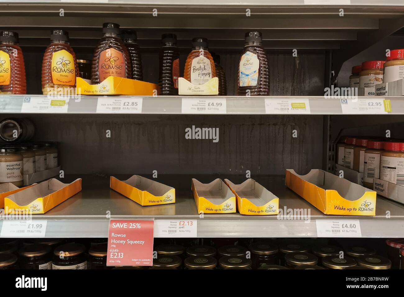 Empty shelves of honey due to corona virus panic hoarding Stock Photo ...