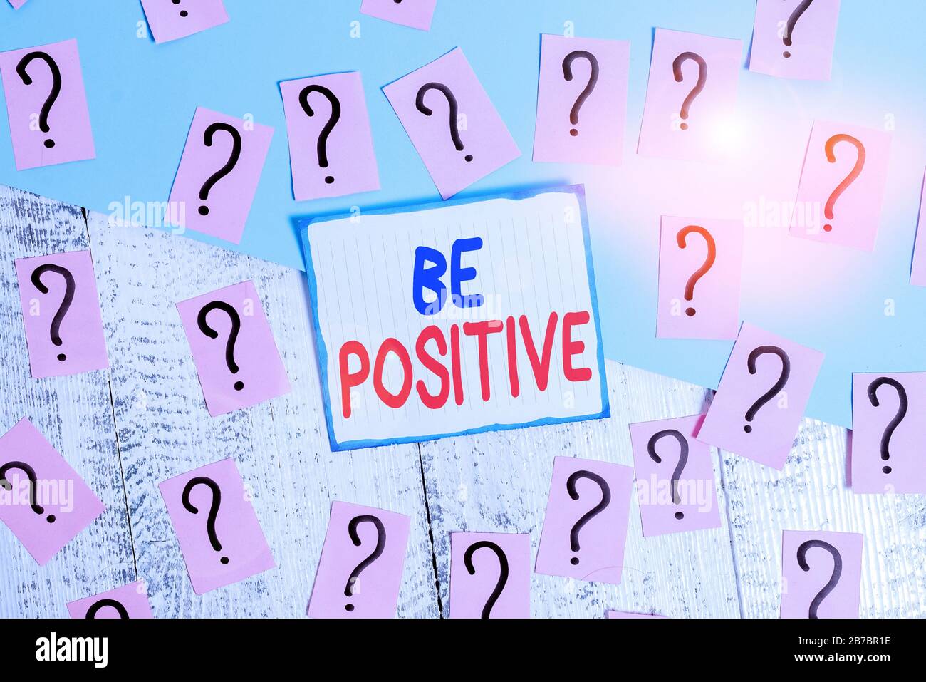 Writing note showing Be Positive. Business concept for giving cause for ...